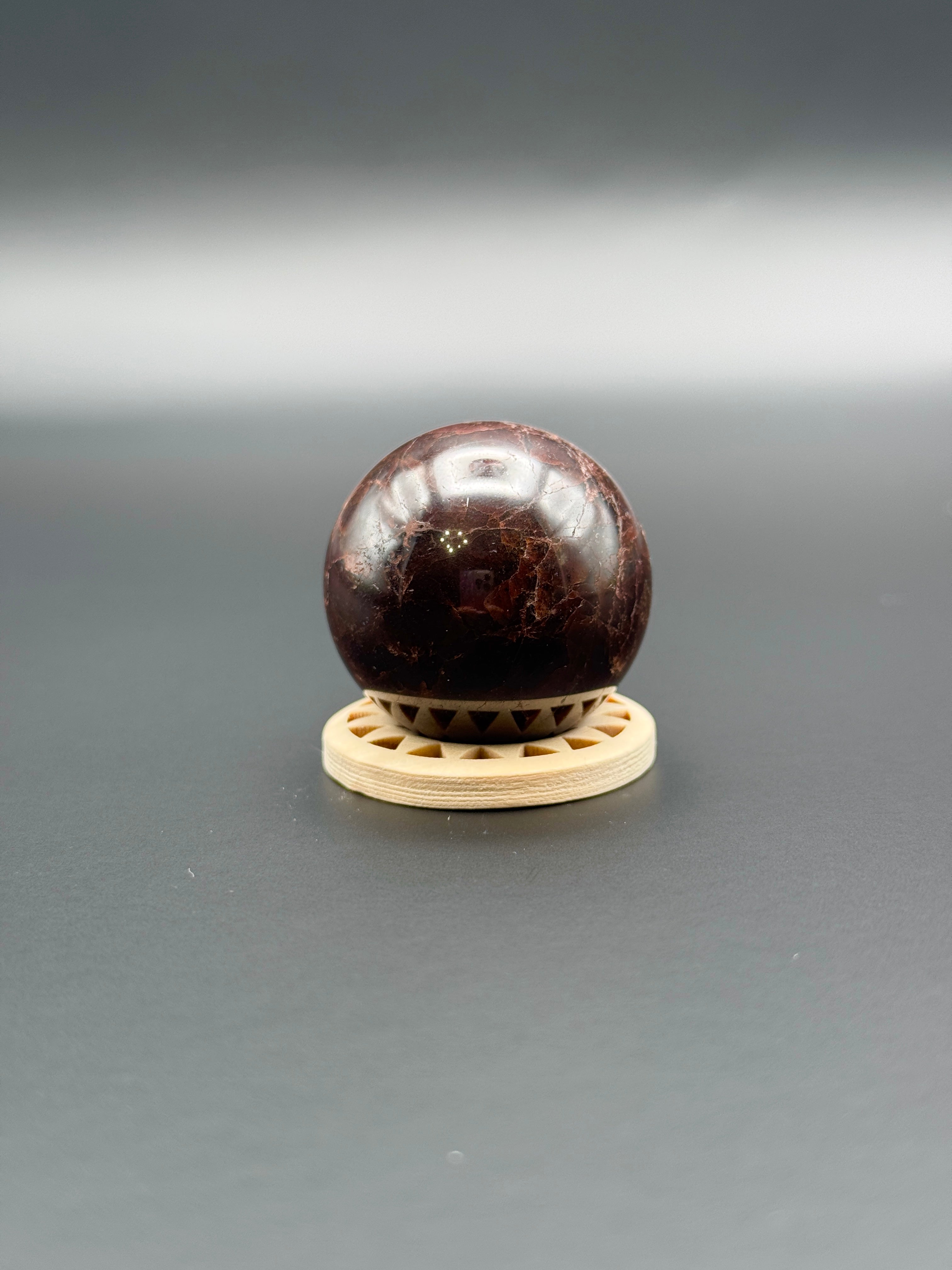 Star Garnet Sphere – Lucky Moon Crystal Bar