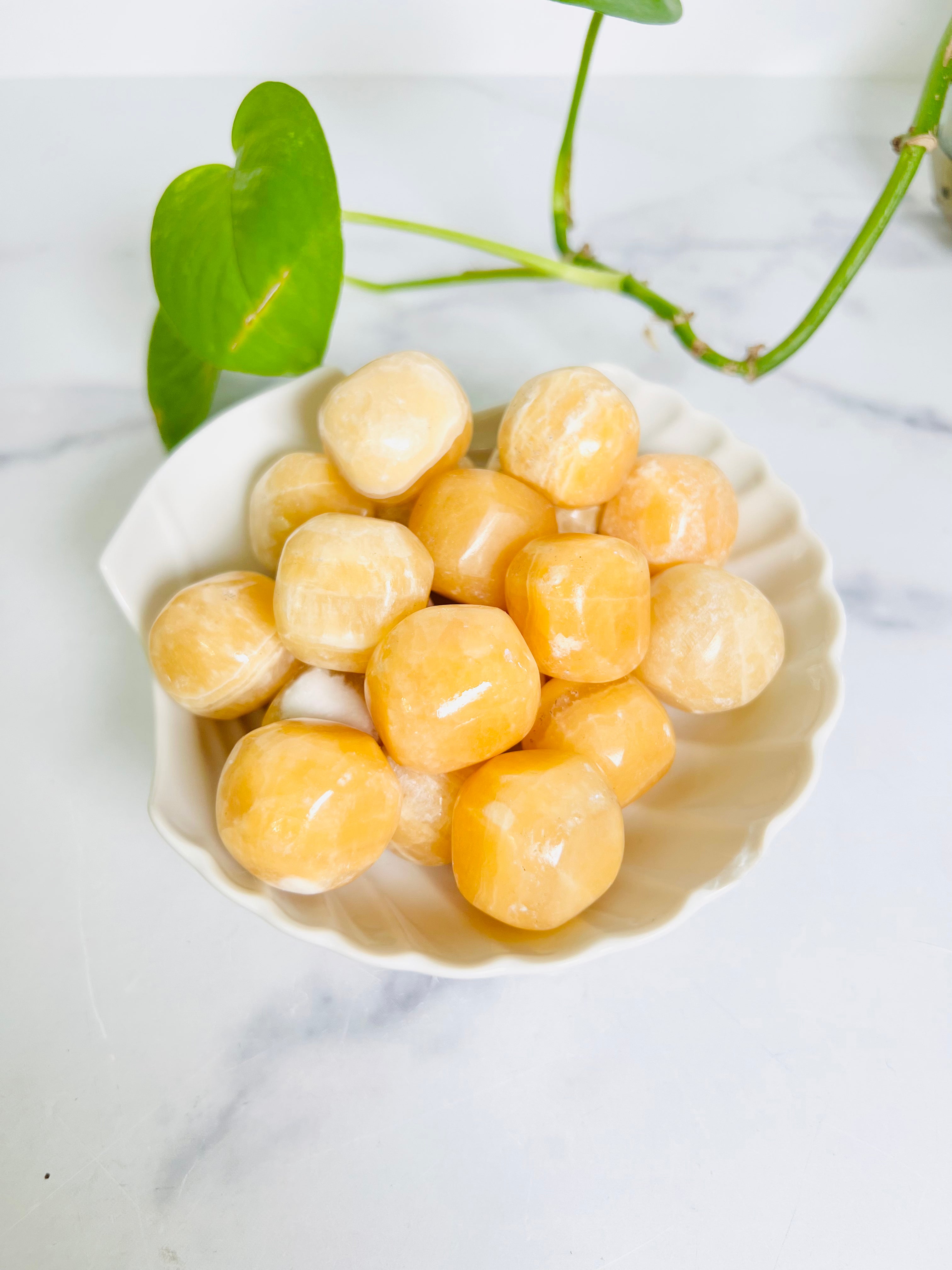 Mango Calcite Tumbled Stone – Lucky Moon Crystal Bar